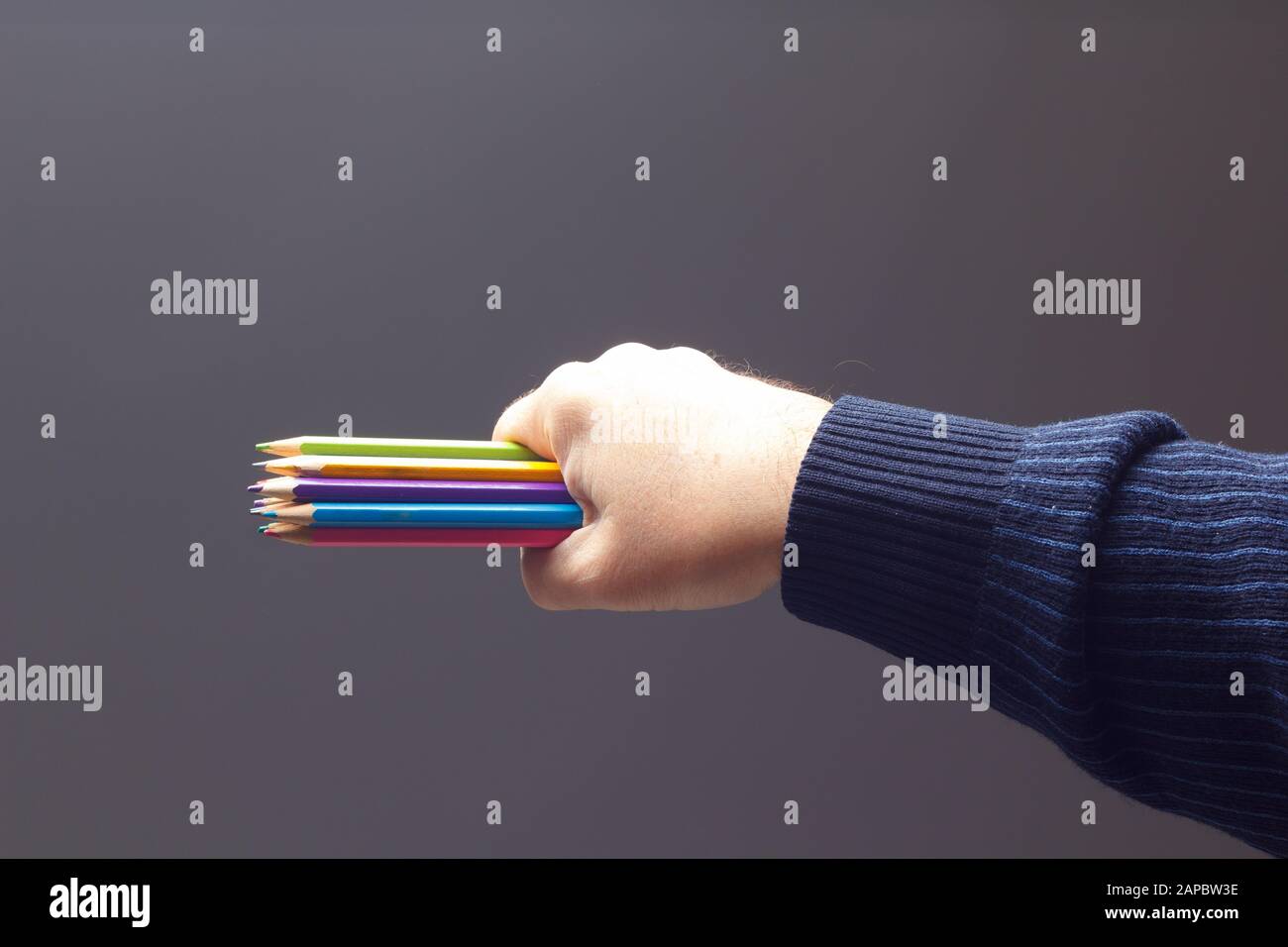 colors with the sharp point, group of colors united in the hand of an ...
