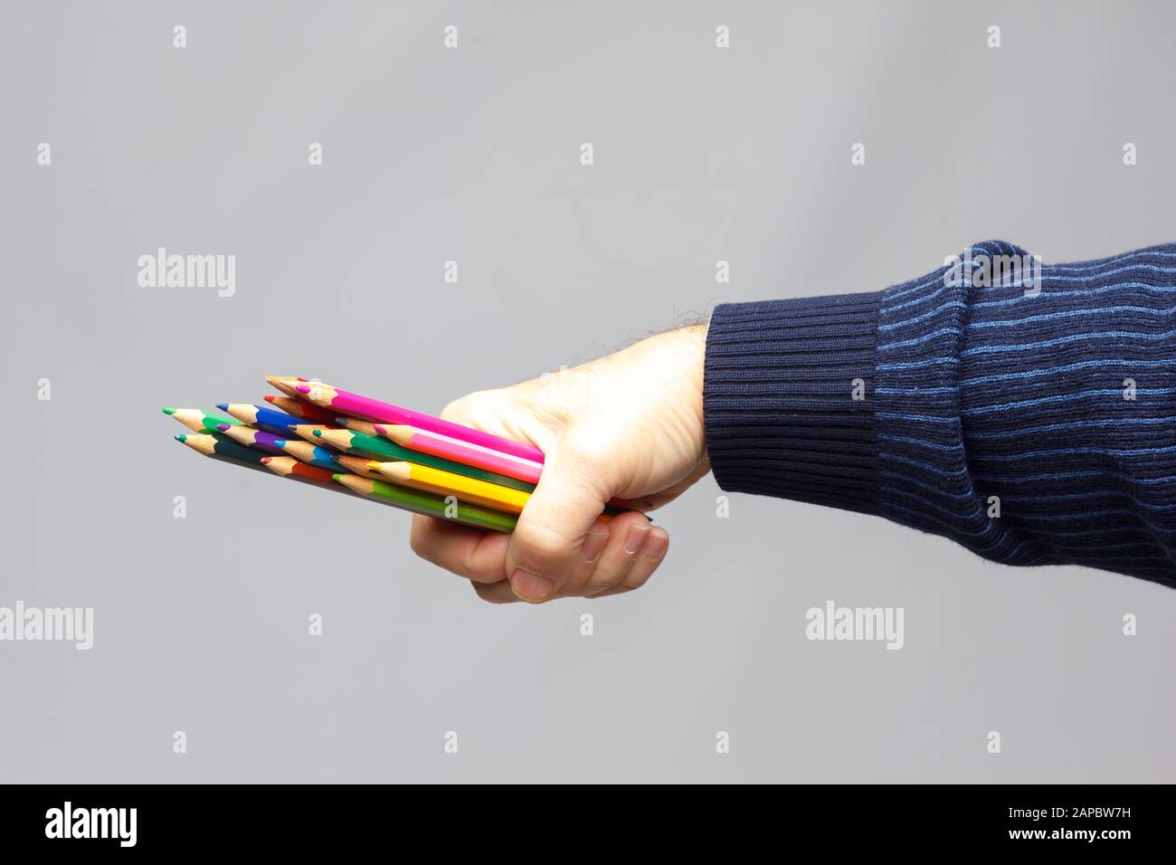 colors with the sharp point, group of colors united in the hand of an ...
