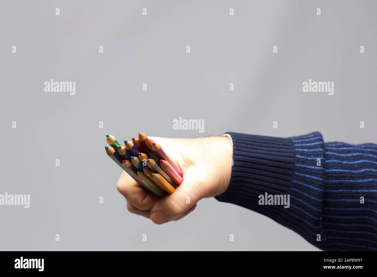 colors with the sharp point, group of colors united in the hand of an ...