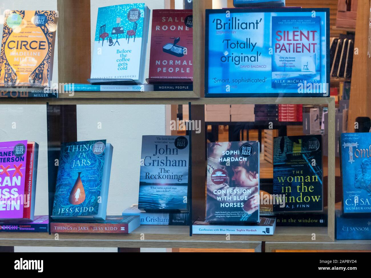 Best-selling hardcover books in the window of a Liverpool bookstore ...