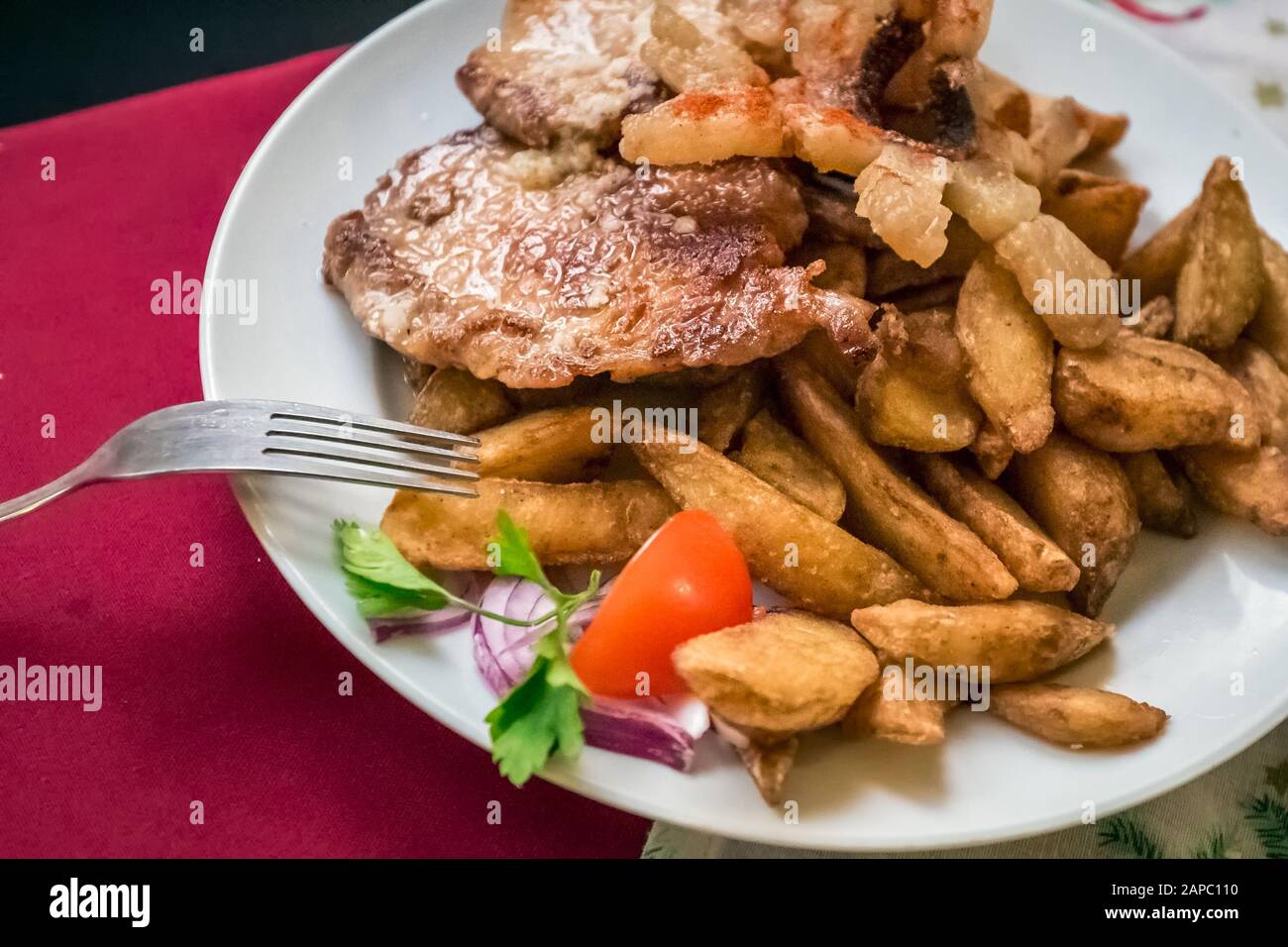Traditional Hungarian food - potatos served with pork and vegetables ...