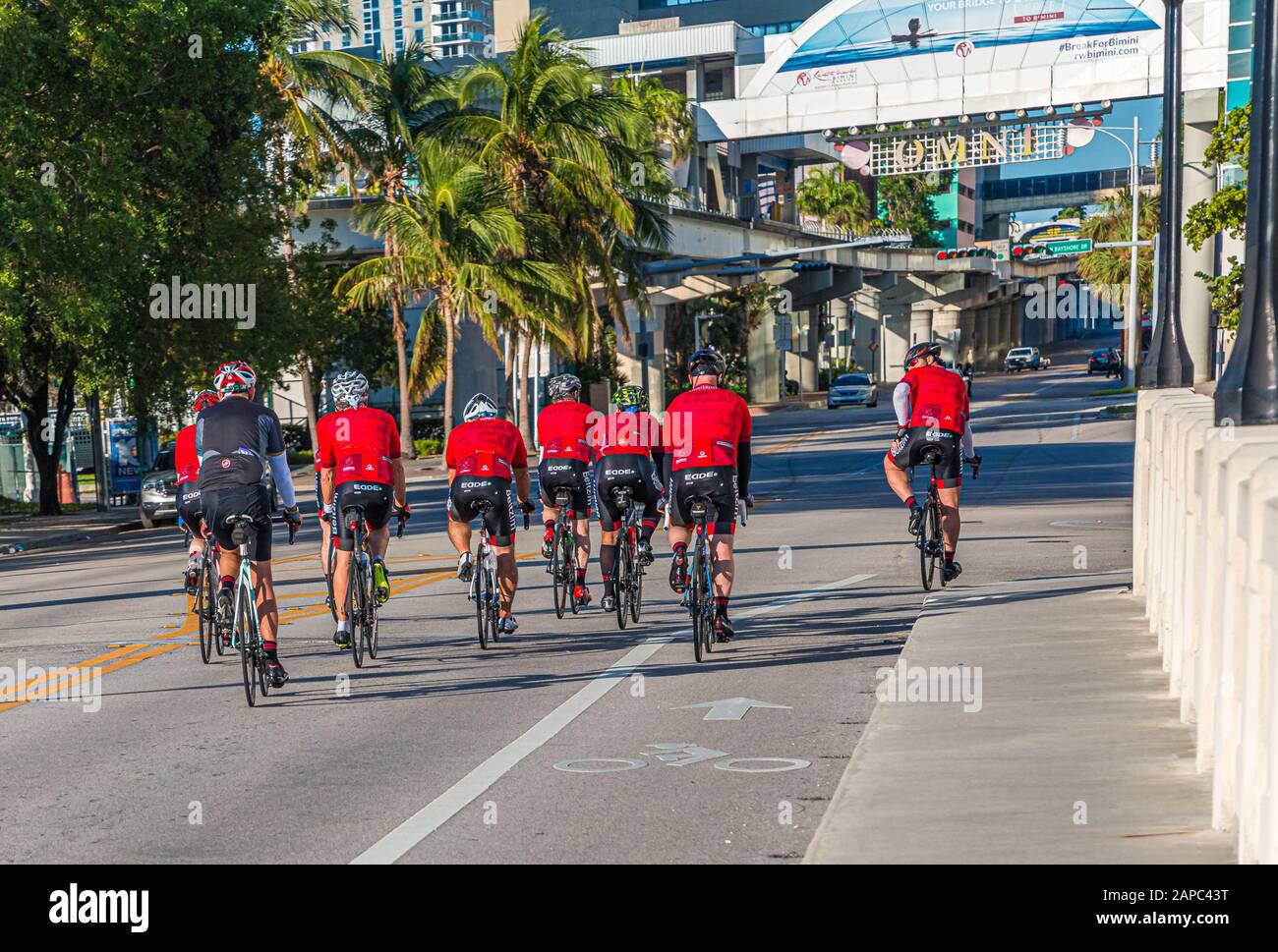 Cyclists in Red Stock Photo - Alamy
