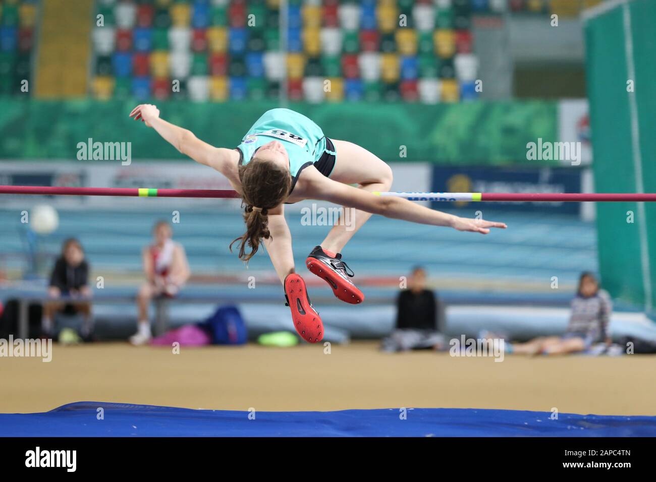 ISTANBUL, TURKEY - JANUARY 12, 2020: Undefined athlete high jumping ...