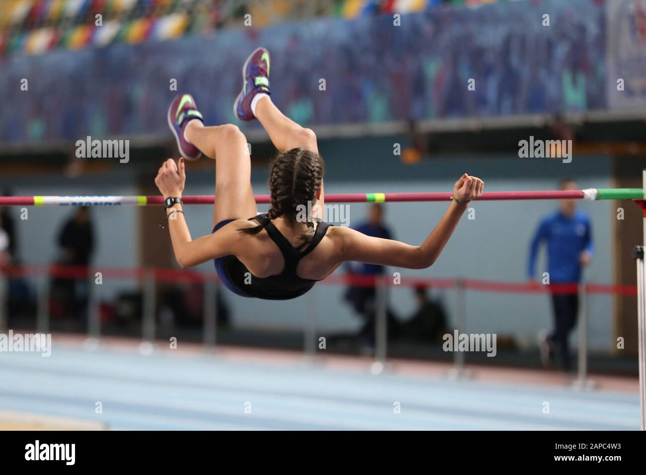 ISTANBUL, TURKEY - JANUARY 12, 2020: Undefined athlete high jumping ...