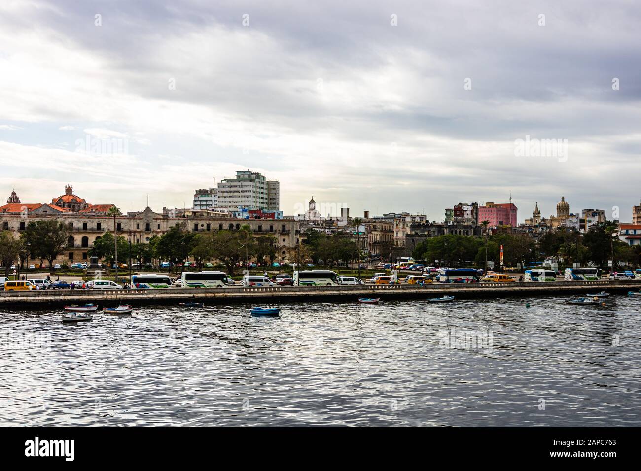 The colonial port of Havana and view over the city and Malecon seawall ...