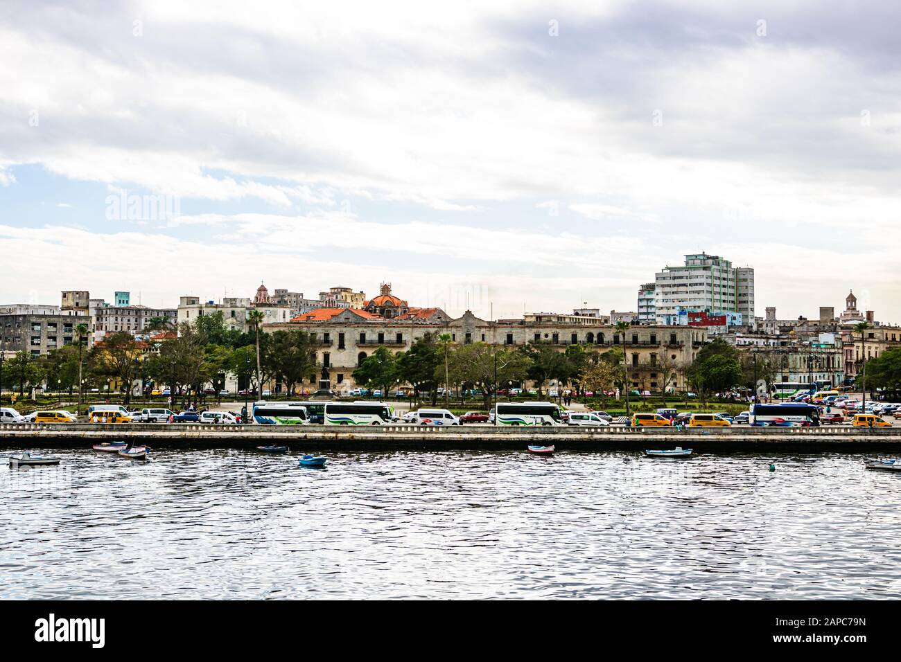 The colonial port of Havana and view over the city and Malecon seawall ...