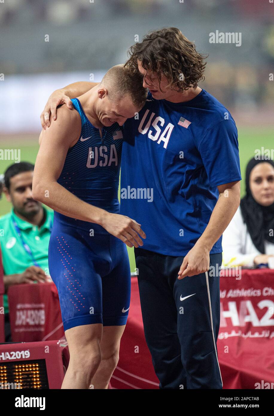 DOHA - QATAR - 0CT 1: Sam Kendricks of the USA being comforted by team mate Cole Walsh after ...