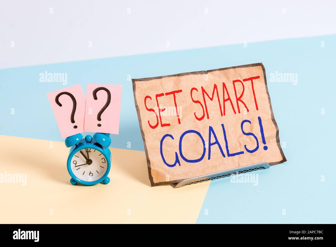 Writing note showing Set Smart Goals. Business concept for list to ...