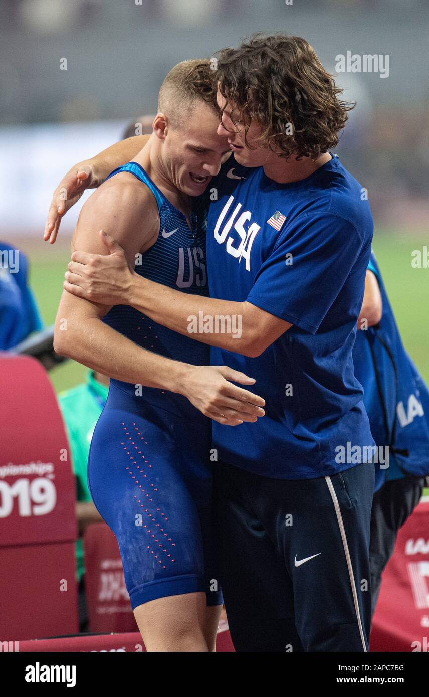DOHA - QATAR - 0CT 1: Sam Kendricks of the USA being comforted by team mate Cole Walsh after ...