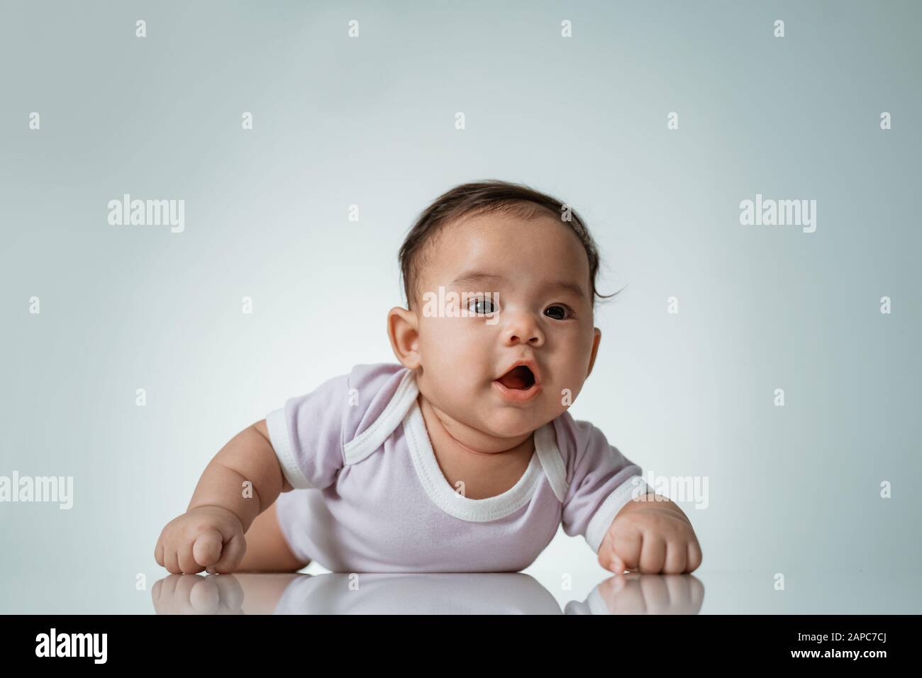 baby is on his stomach development Stock Photo - Alamy