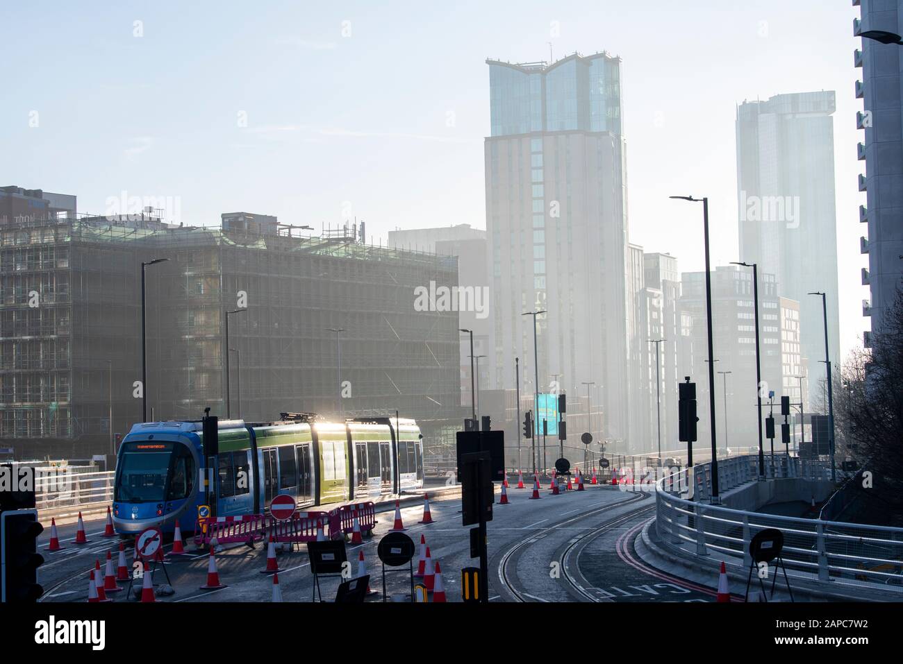 A tram leaving the new Library stop in Centenary Square in Birmingham ...