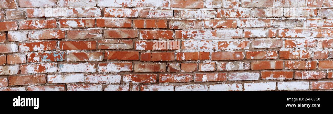Rustic red brick background with white paint Stock Photo - Alamy