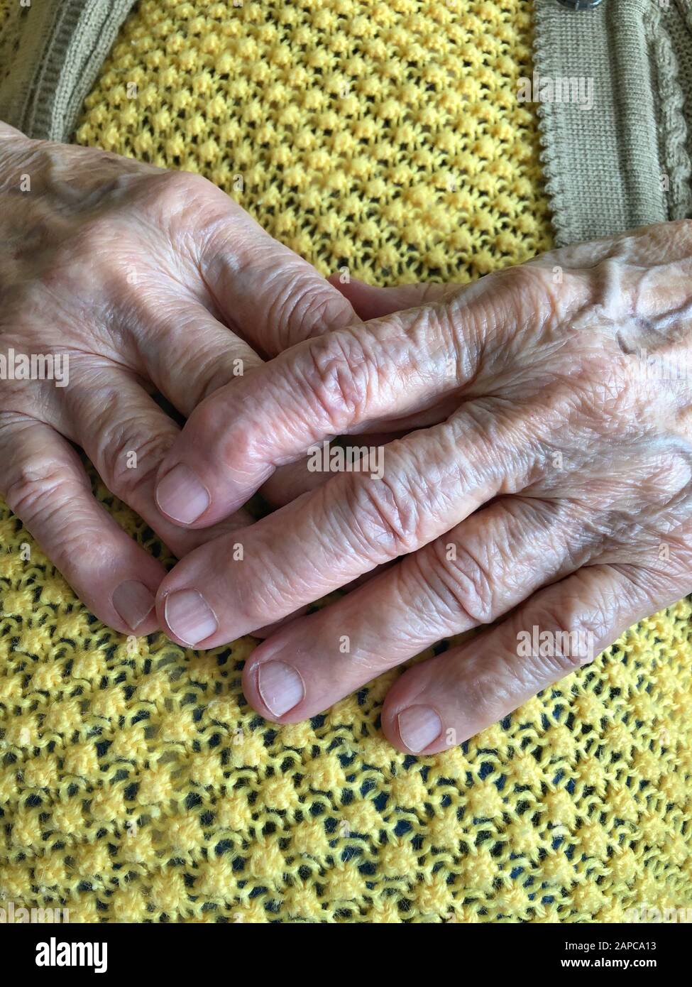 Closeup wrinkled hands of a senior person Stock Photo - Alamy