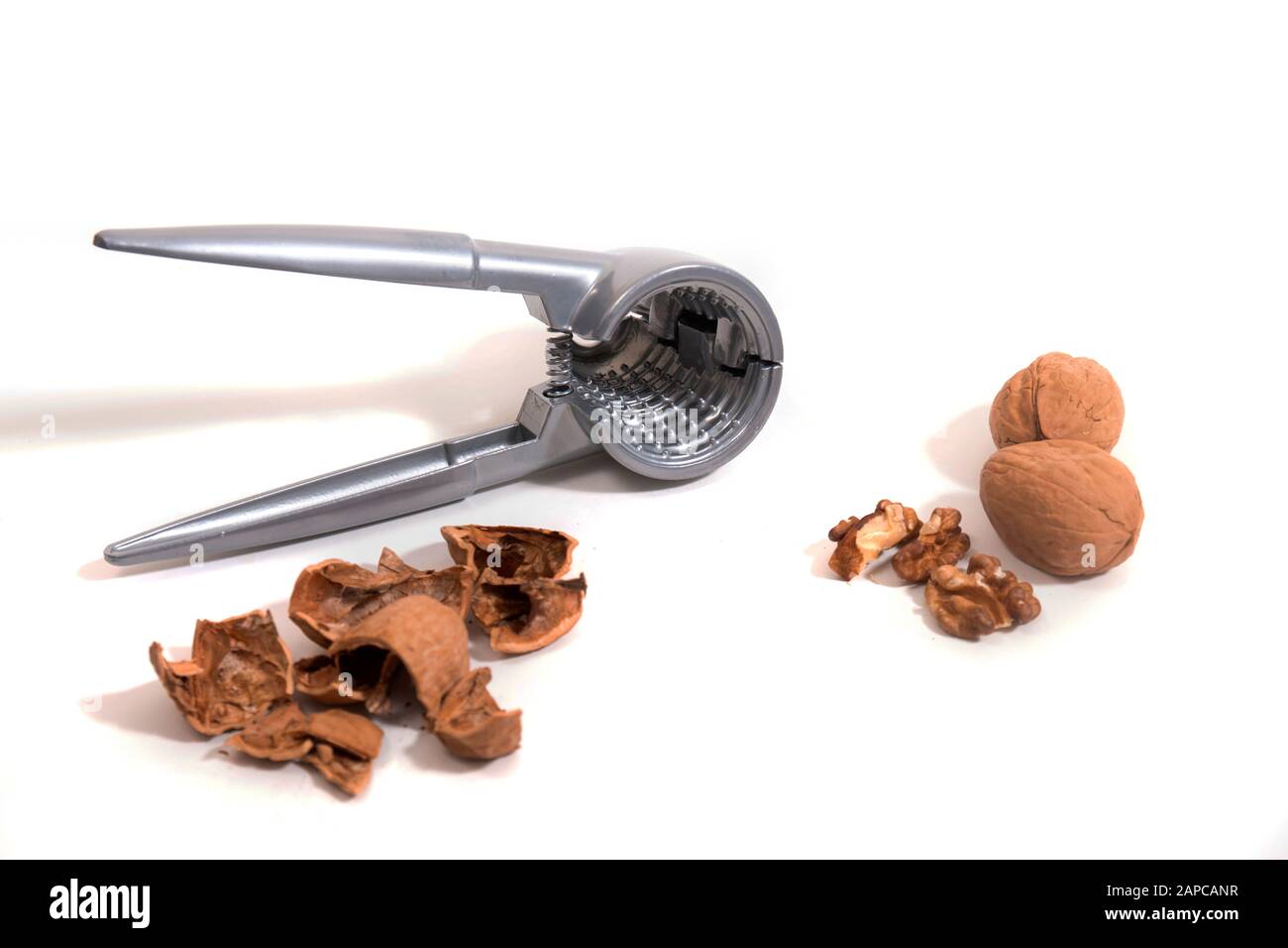 View of a metal tool for cracking nuts isolated on a white background ...