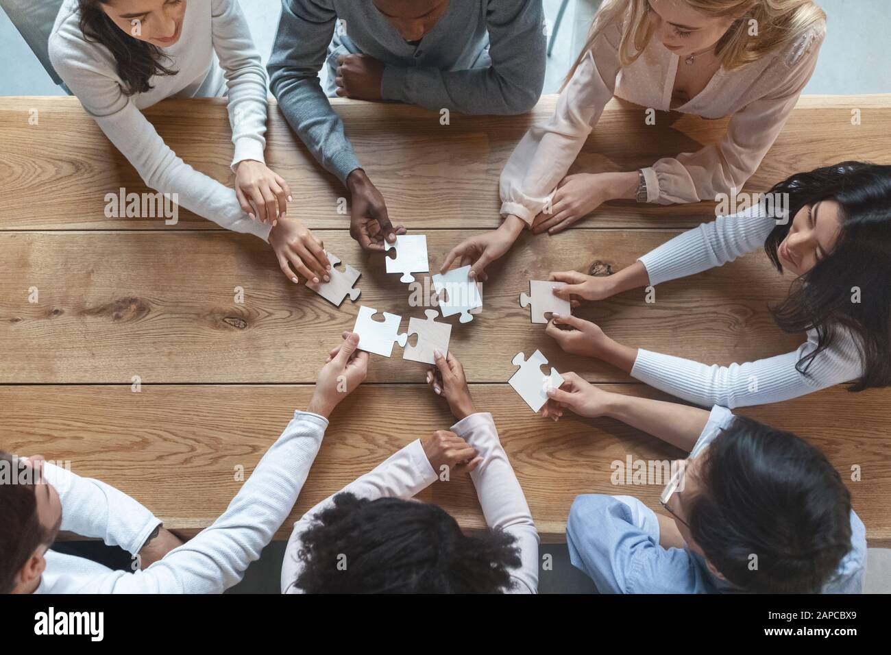 Putting the puzzle together hi-res stock photography and images - Alamy