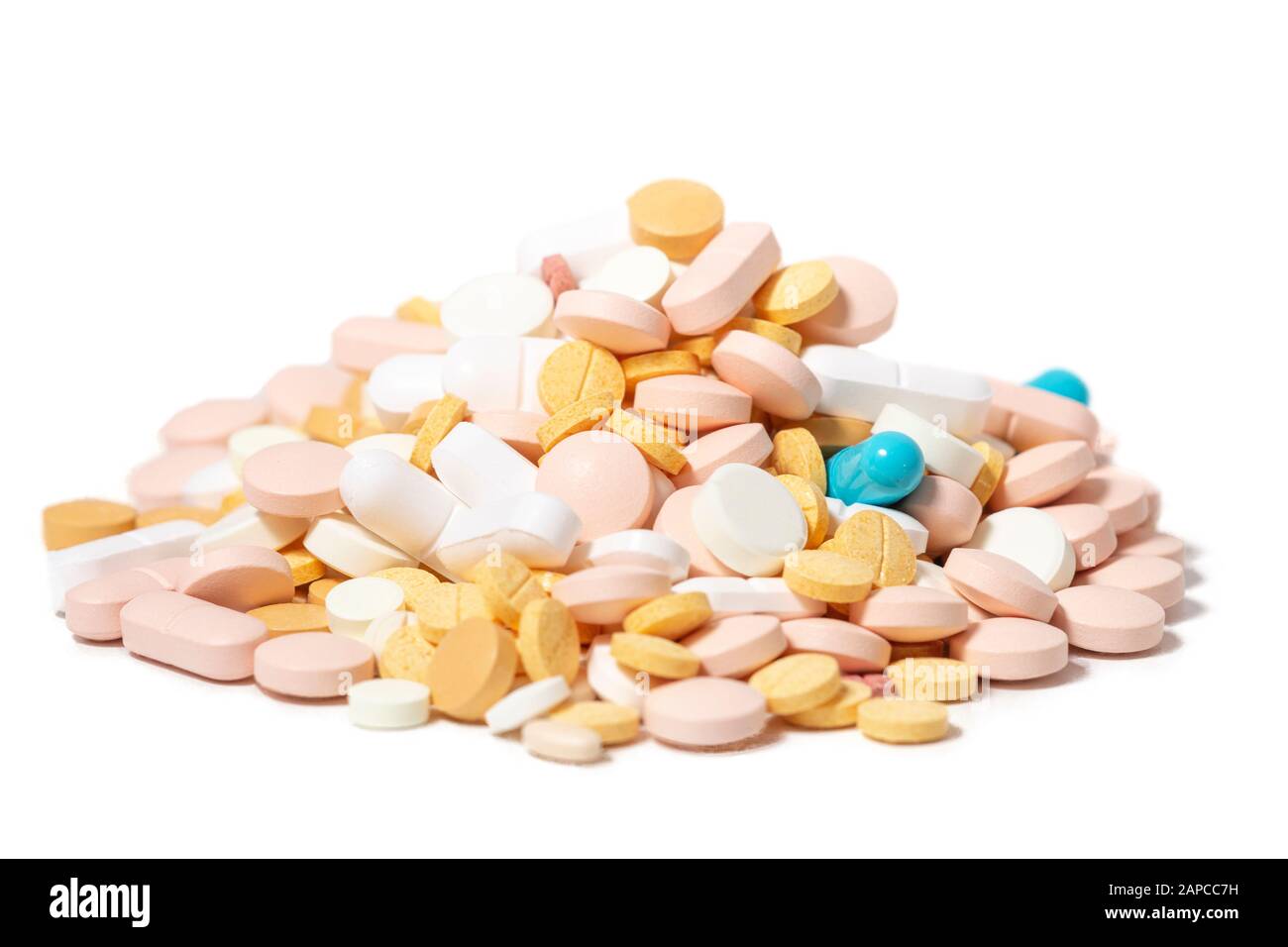 Assorted mix of pills over a white background Stock Photo - Alamy