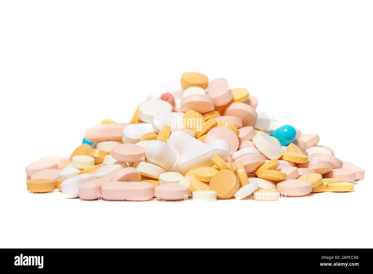 Assorted mix of pills over a white background Stock Photo - Alamy
