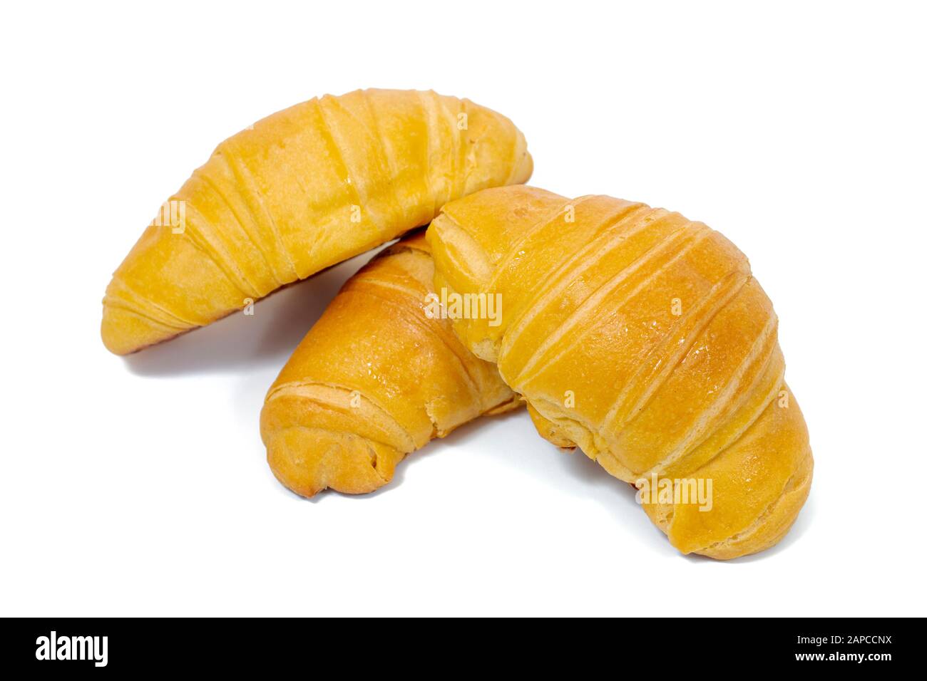 Classic croissant buns isolated on a white background Stock Photo - Alamy