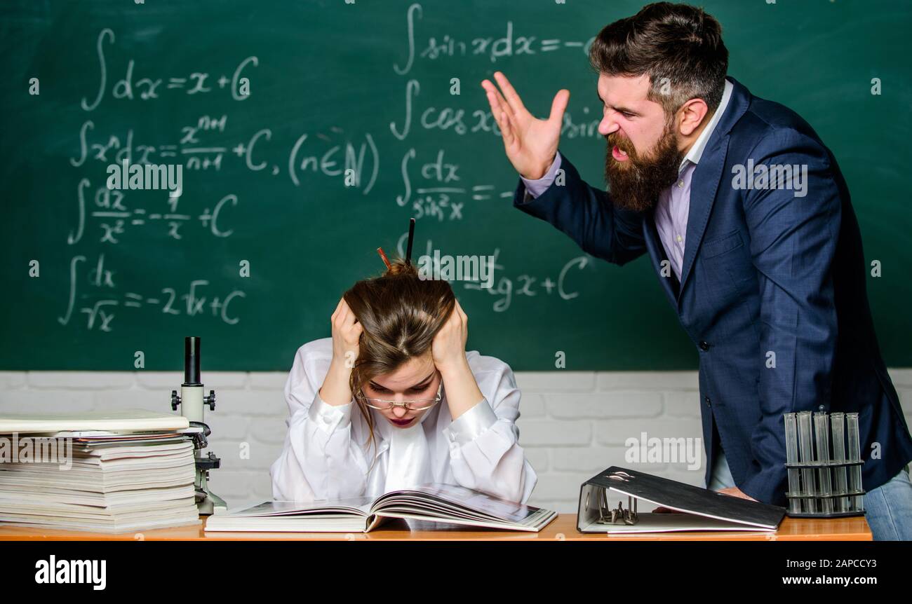 Teacher strict serious bearded man having conflict with student girl ...