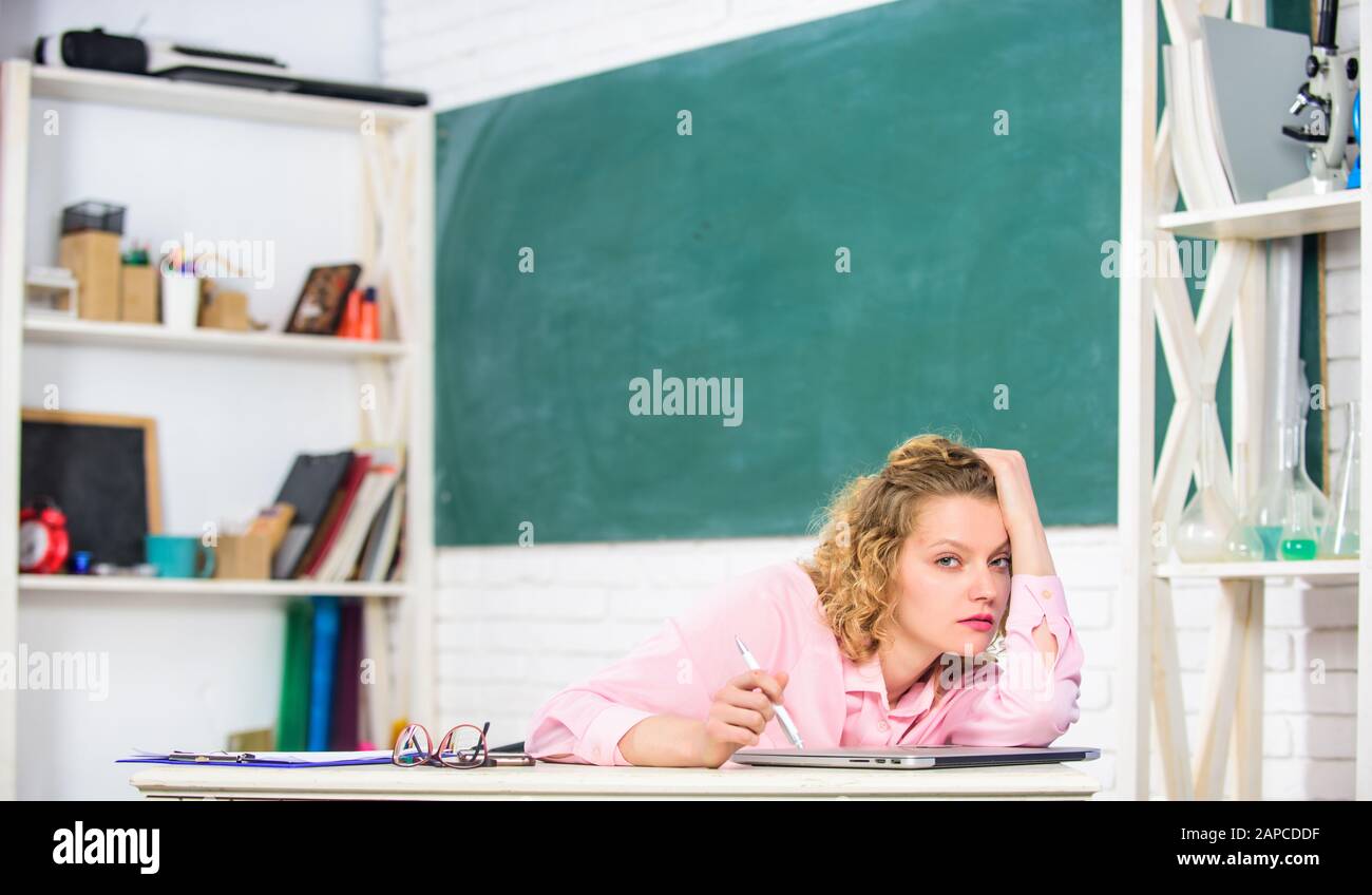 Tired tutor fall asleep at workplace. Tired student lean on desk. Woman ...