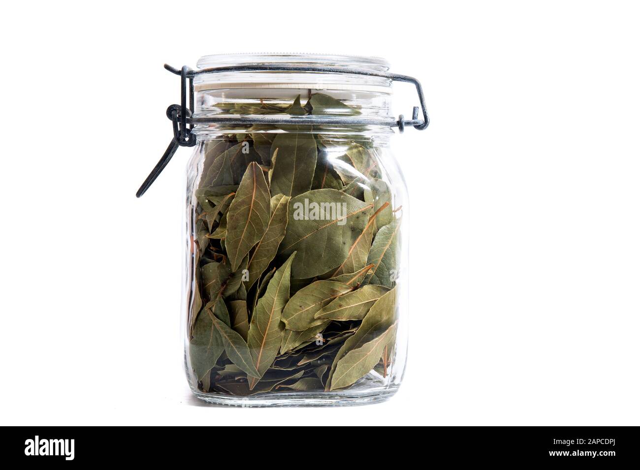 jar with bay laurel leafs isolated on a white background Stock Photo ...