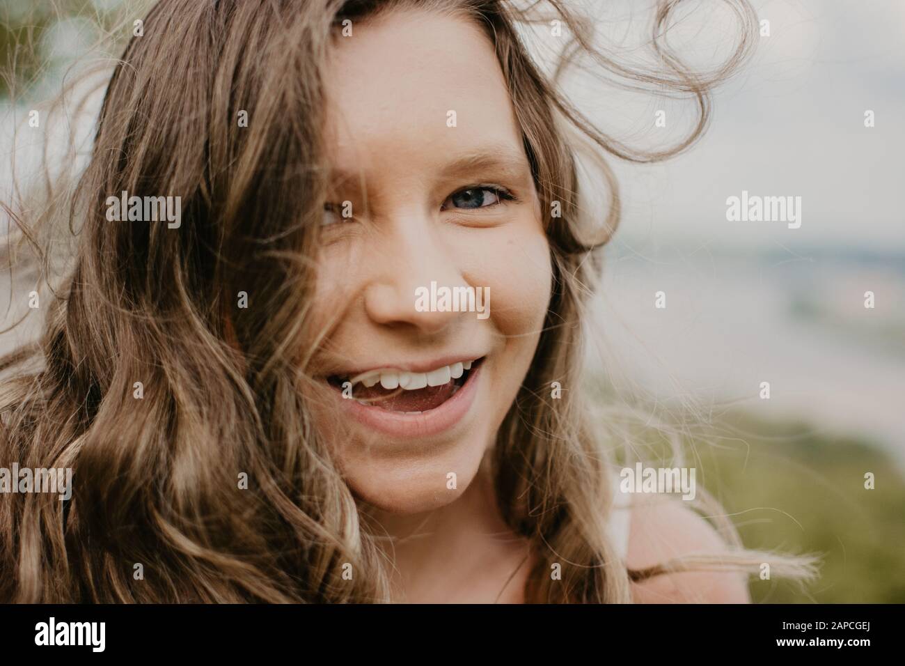 Girl on windy overlook Stock Photo - Alamy