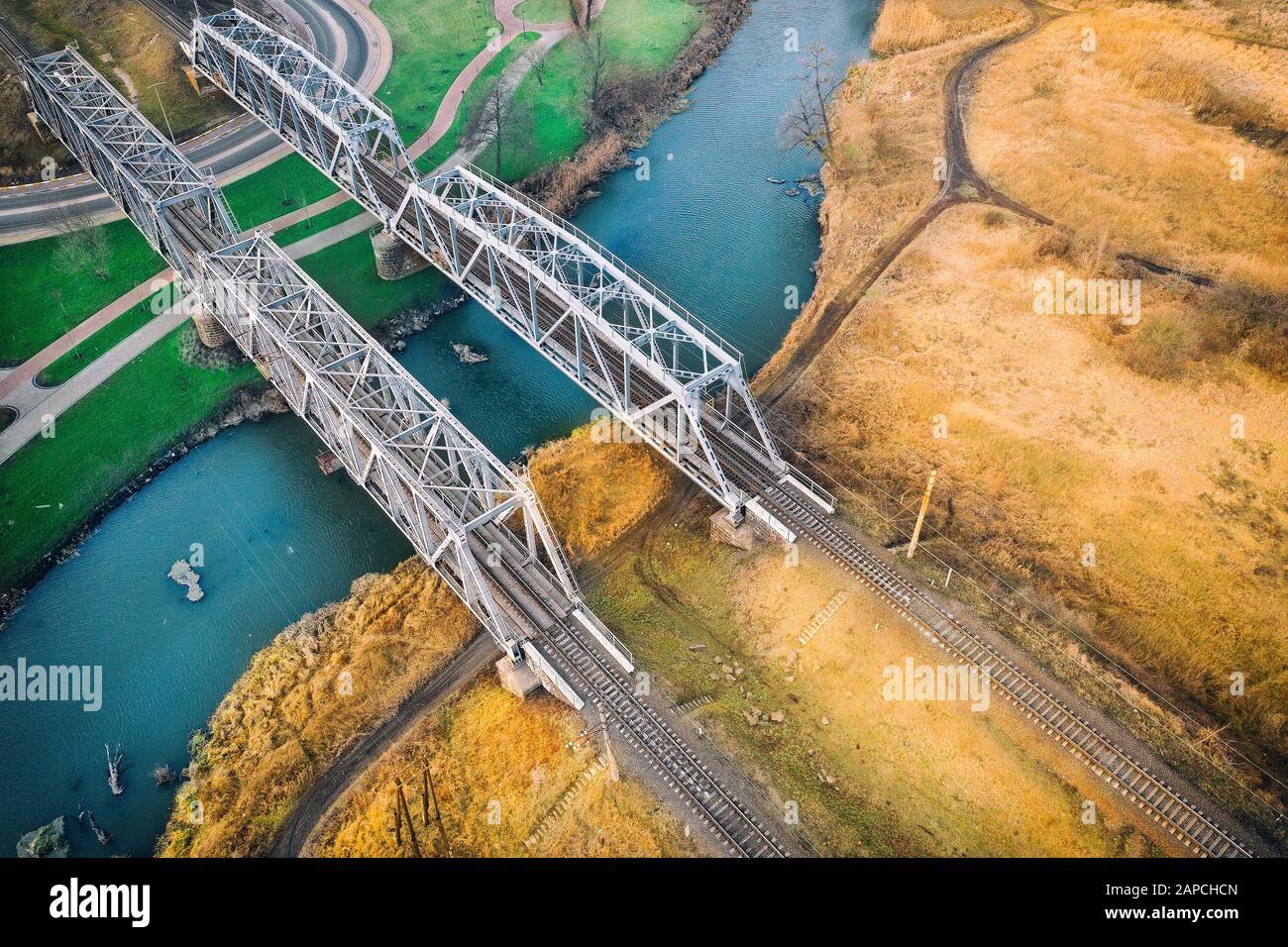 Two metal railway bridges over a small river, view from the drone Stock ...