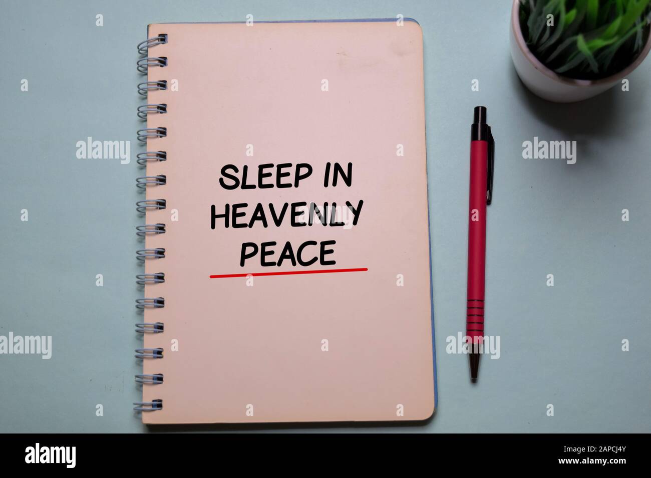 Sleep in Heavenly write on a book isolated on office desk. Christian ...