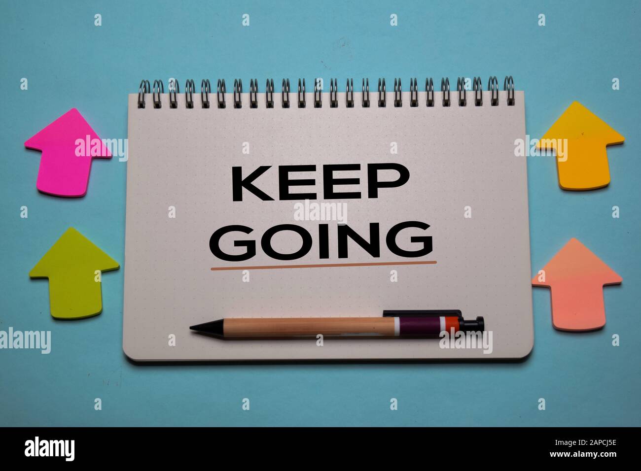 Keep Going write on a book isolated on office desk. Christian faith ...