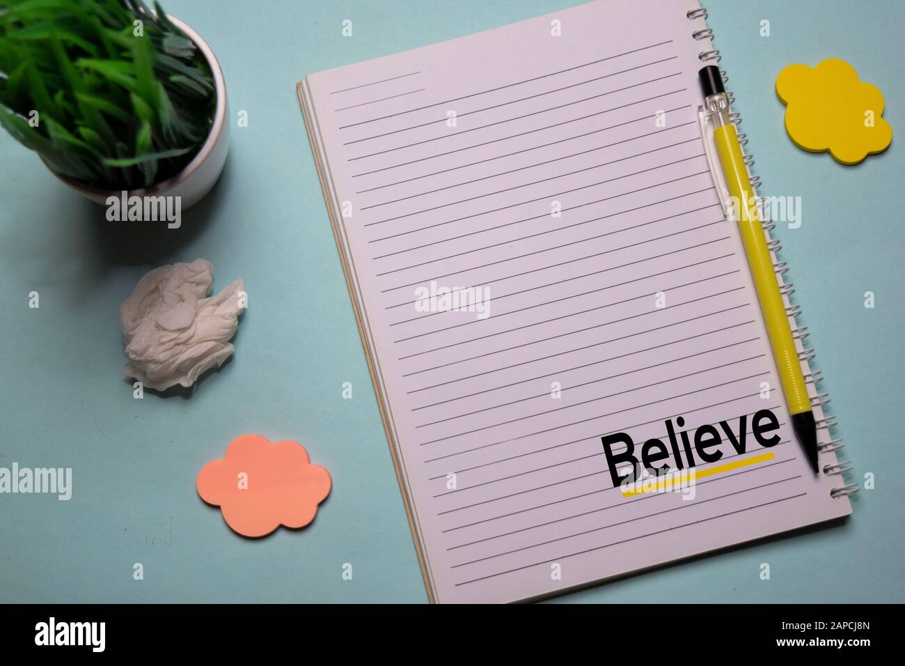 Believe write on a book isolated on office desk. Christian faith ...