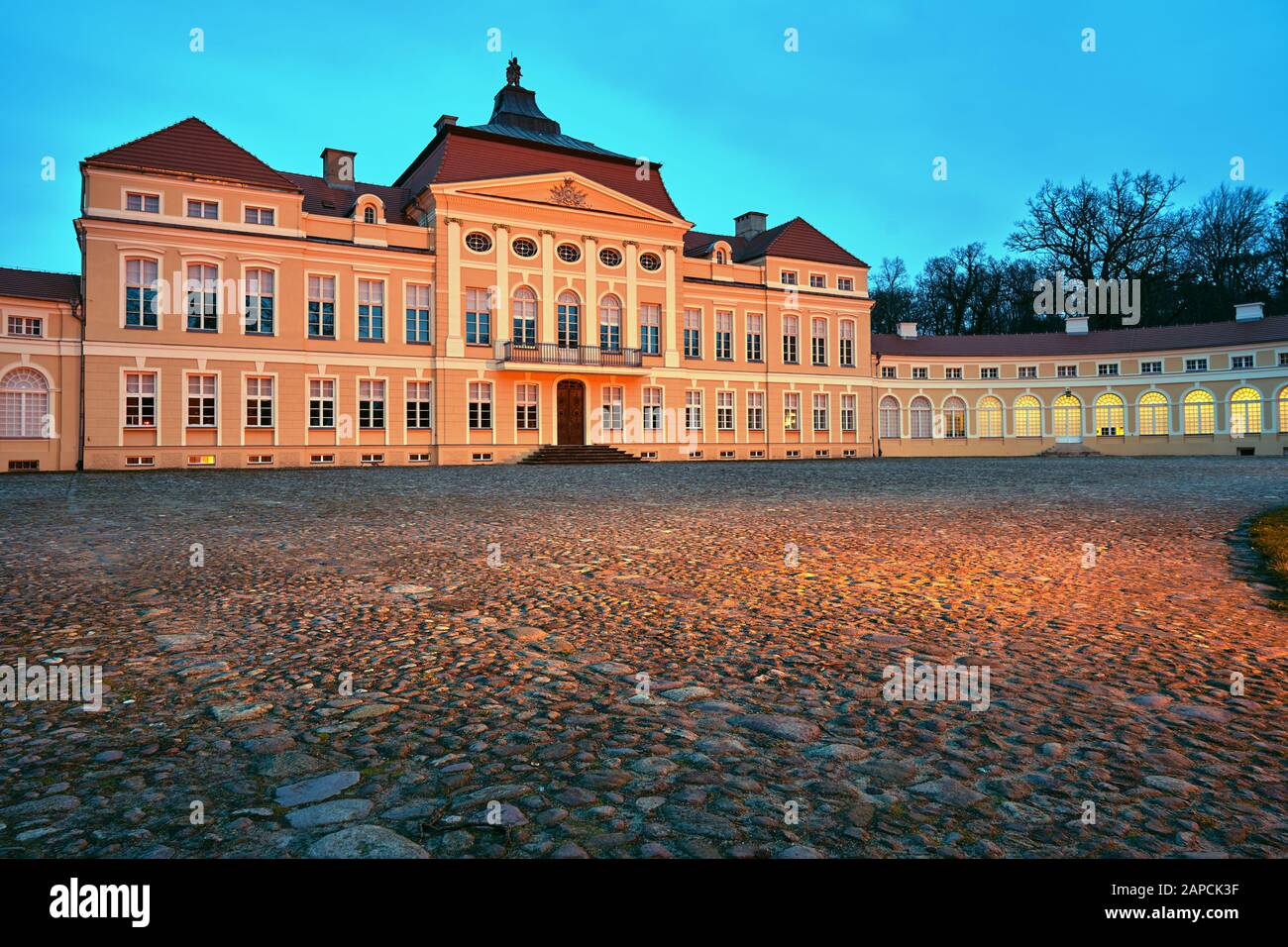 night view of the illuminated elevation of the baroque historic palace ...