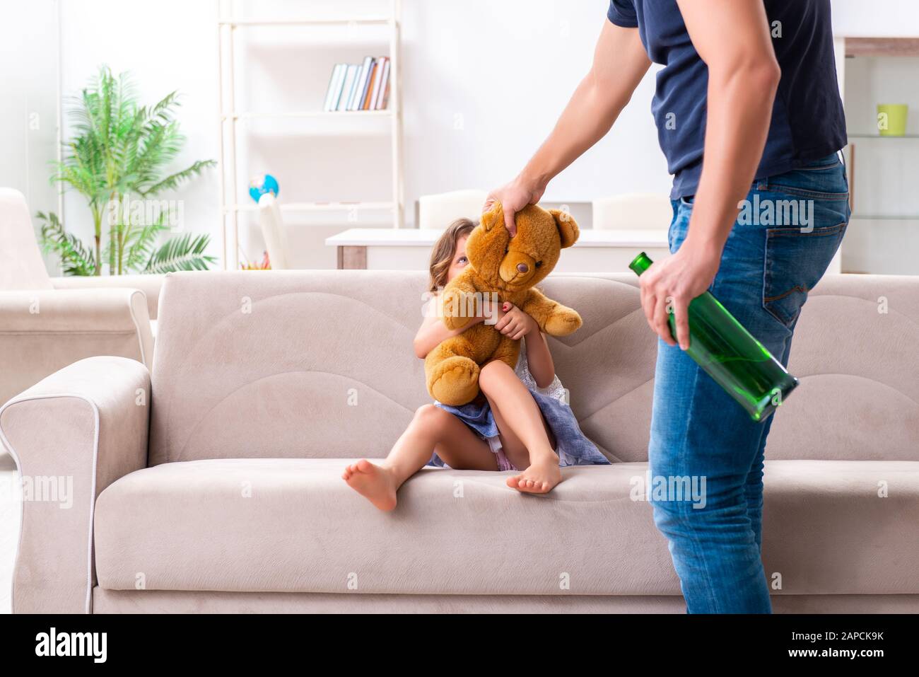 The drunk father in domestic child abuse and violence concept Stock ...