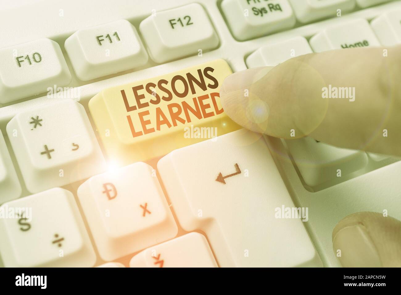 Conceptual hand writing showing Lessons Learned. Concept meaning the knowledge or understanding ...