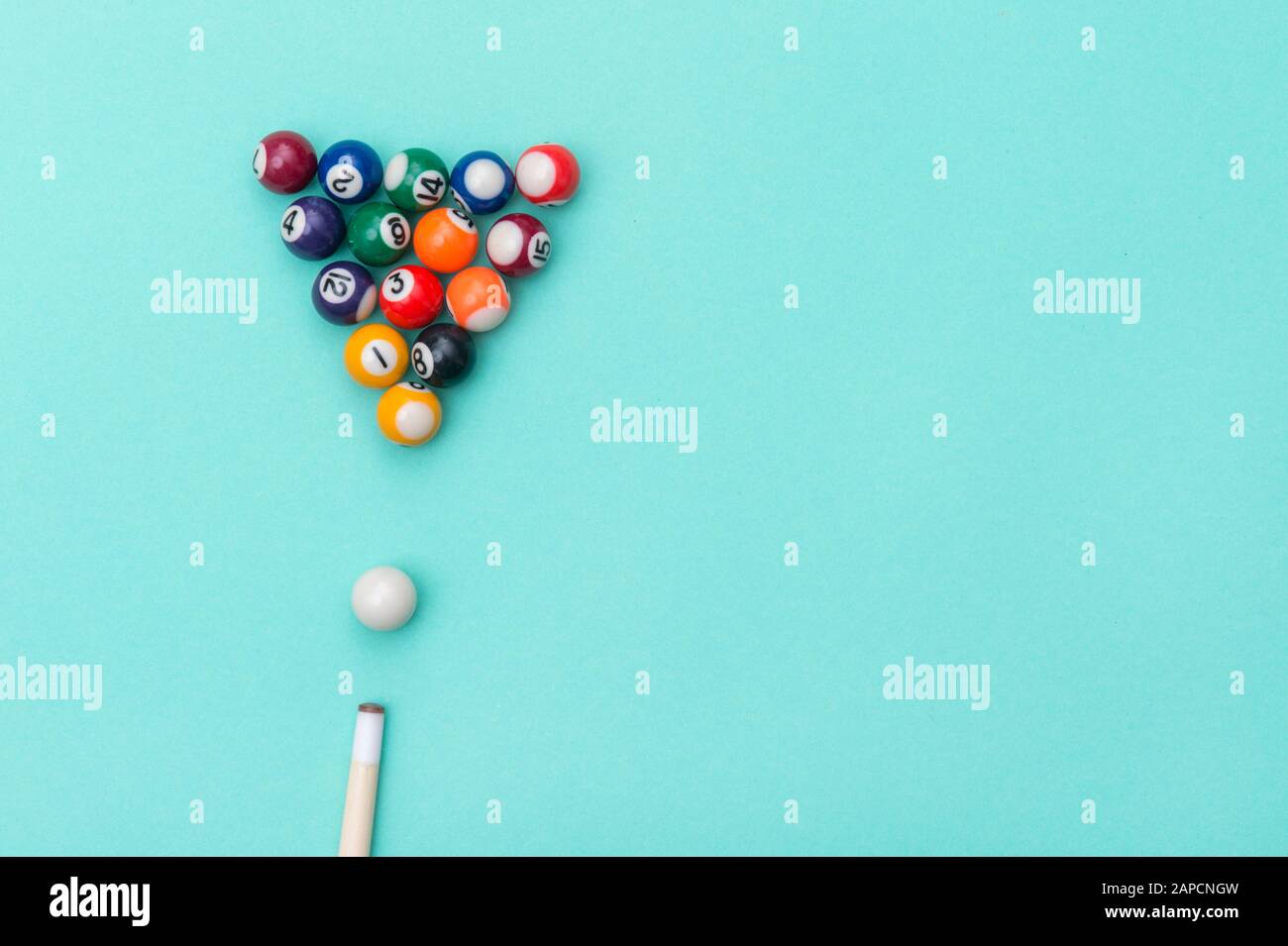 Pool Billiard equipments on a green background Stock Photo - Alamy