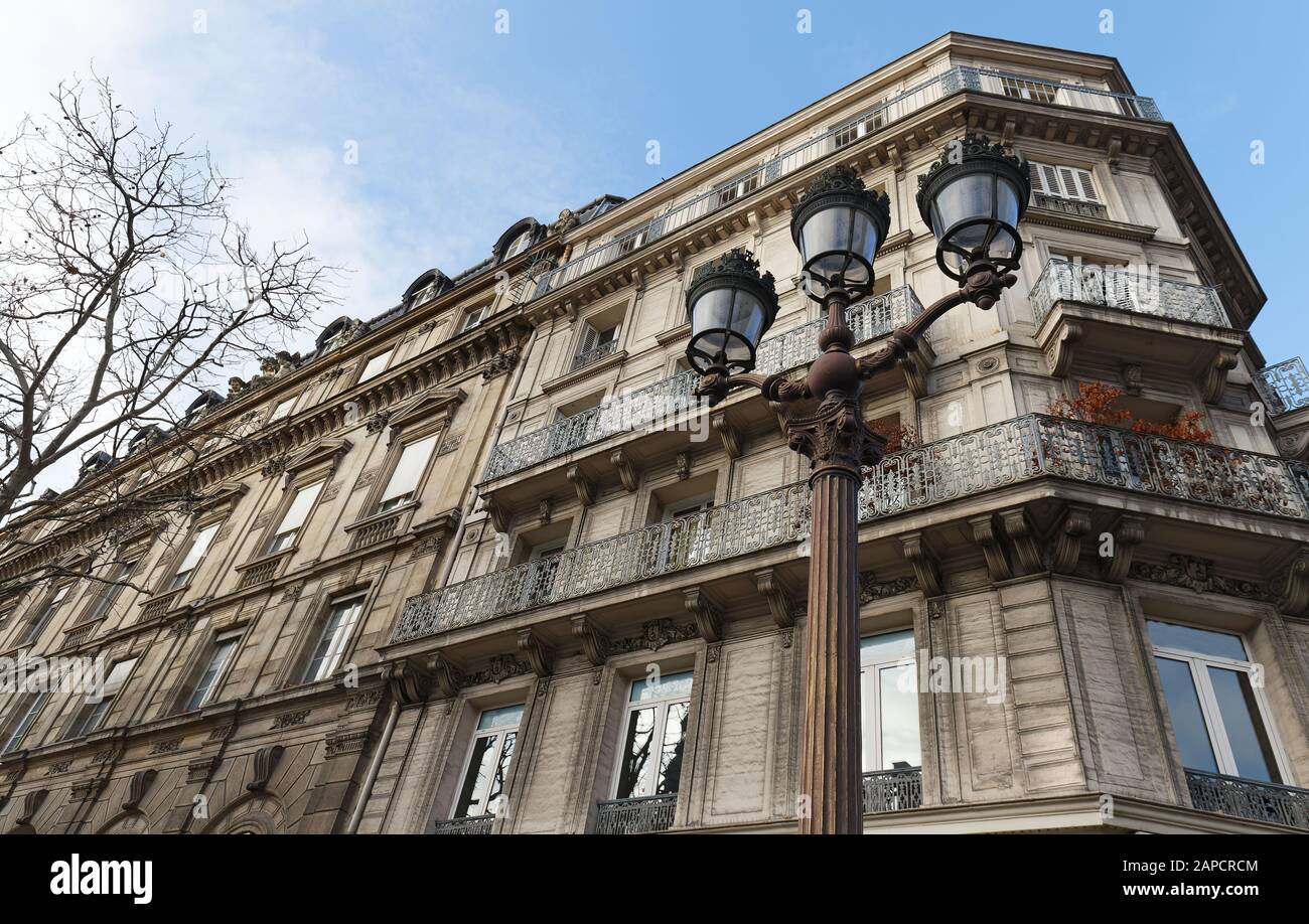 Traditional French house with typical balconies and windows. Paris ...