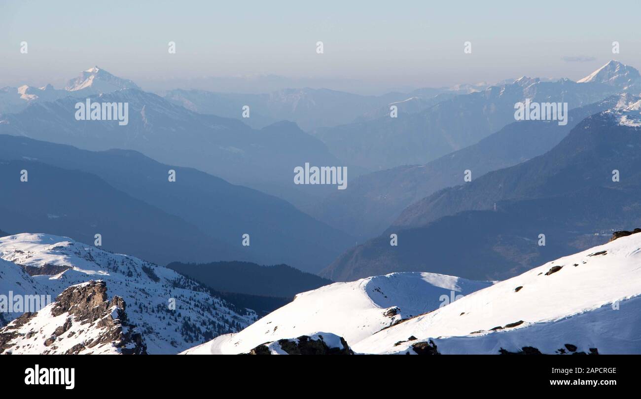 Courchevel view valley dust mood sunset with snowy mountain landscape ...