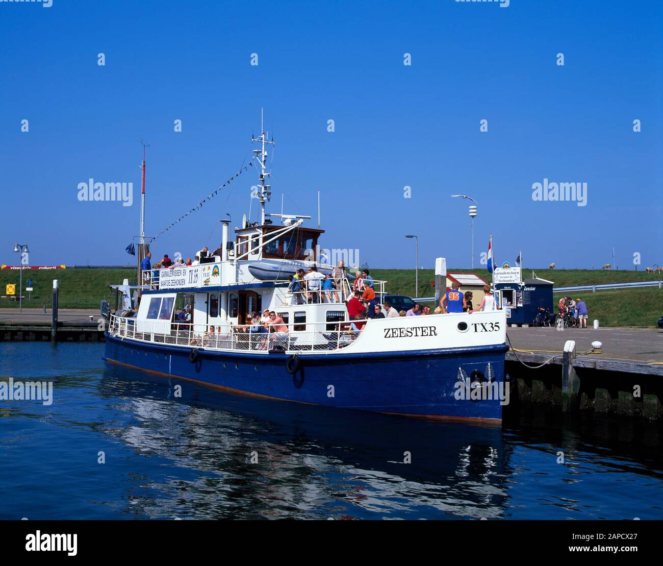 Tourist cruise ship in the harbour of Oudeschild, Texel Island, North ...