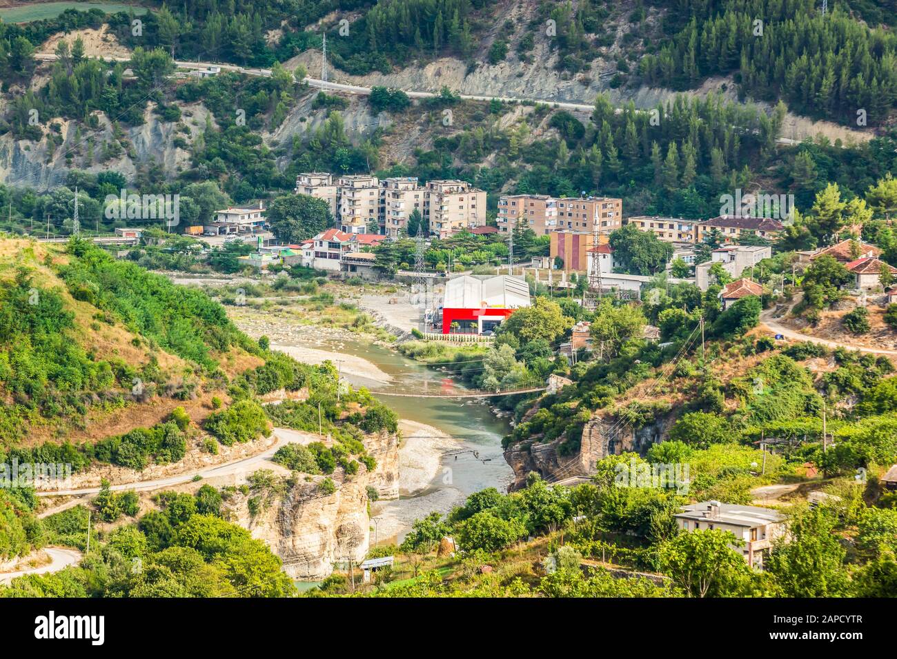Corovode, Albania - July 31, 2014. Panoramic view on city by the river ...