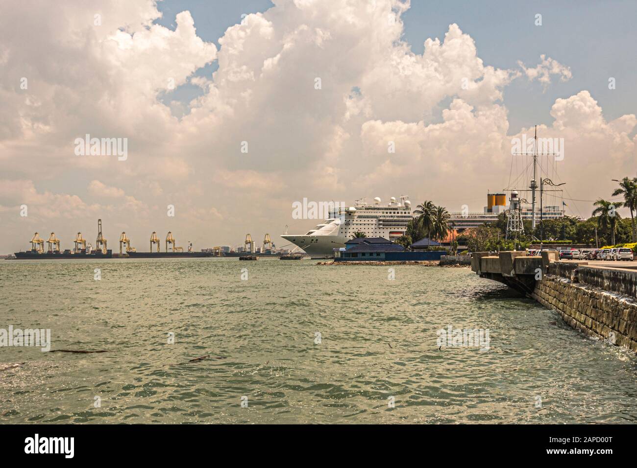 View of cranes boats and cruises in the port of Georgetown on Penang ...