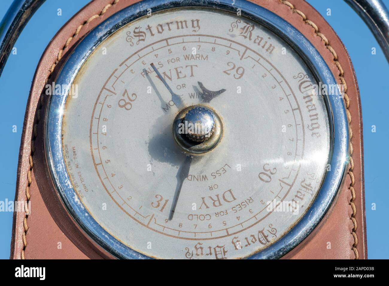 Close up of an antique barometer made out of an old horses stirrup ...