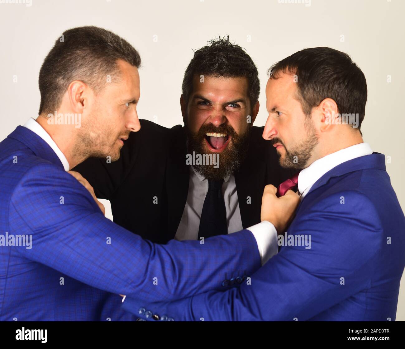 Conflict and business concept. Businessmen wear smart suits and ties ...