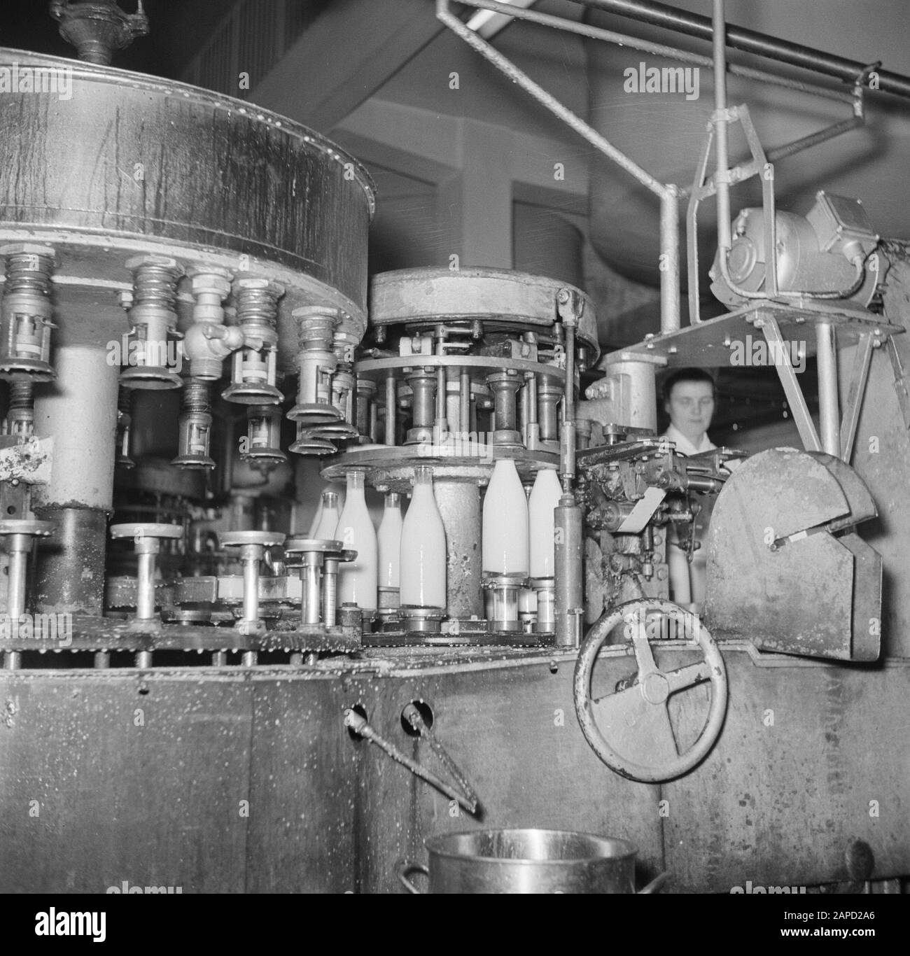 Milk factory in Denmark Description: Filling machine on the assembly ...