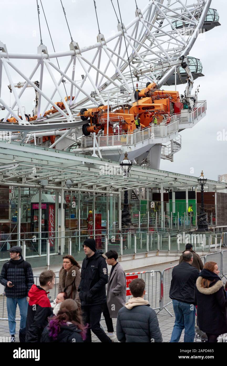 People walking past the closed for public London Eye during the annual ...