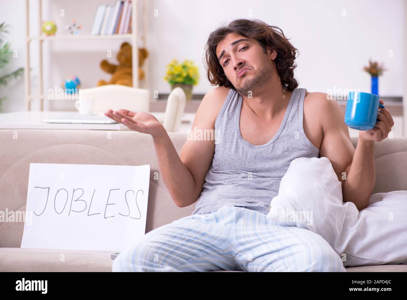 The unemployed man desperate at home Stock Photo - Alamy