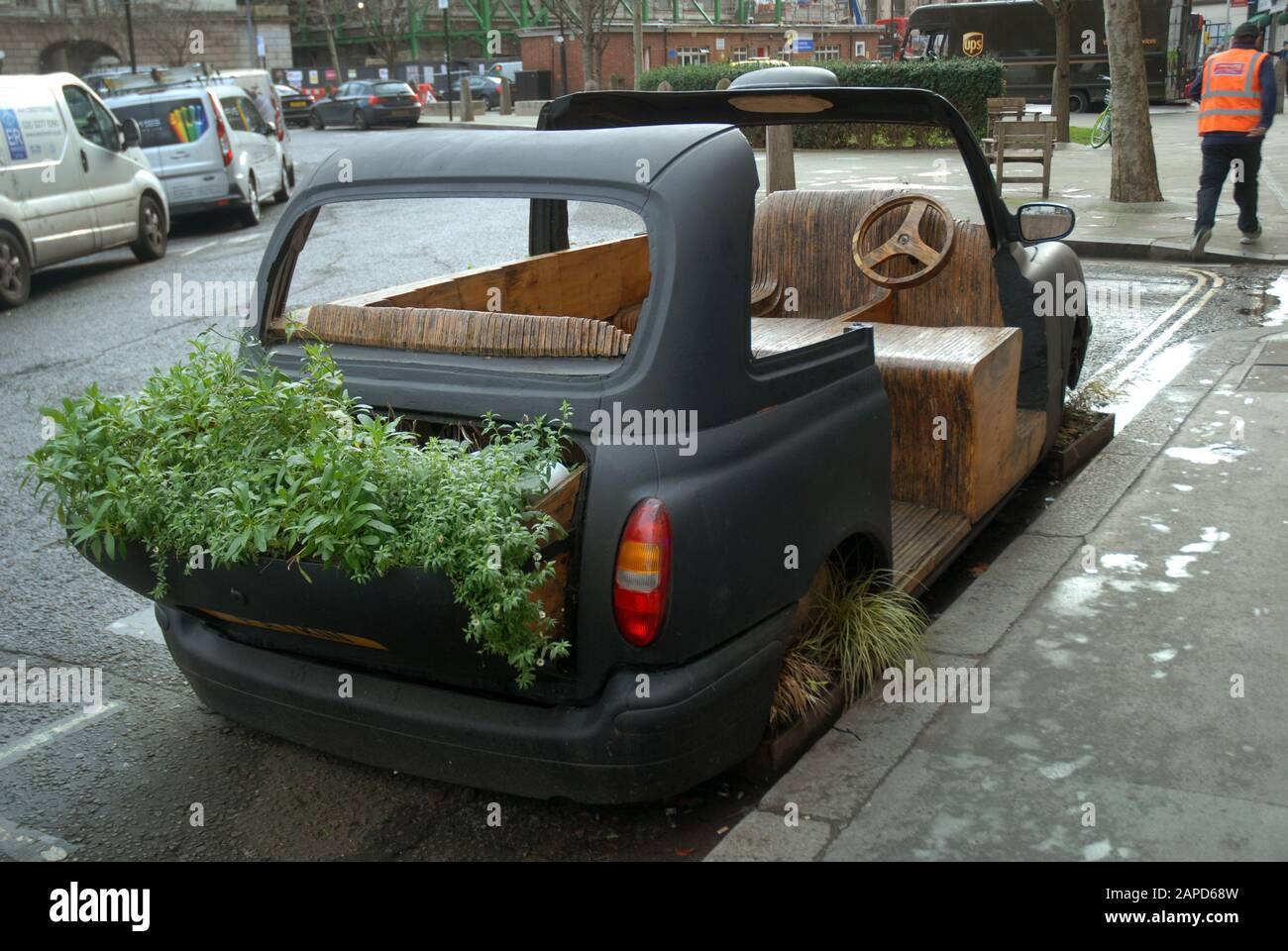 A flower bed made of old London Taxi Cab, London Stock Photo - Alamy