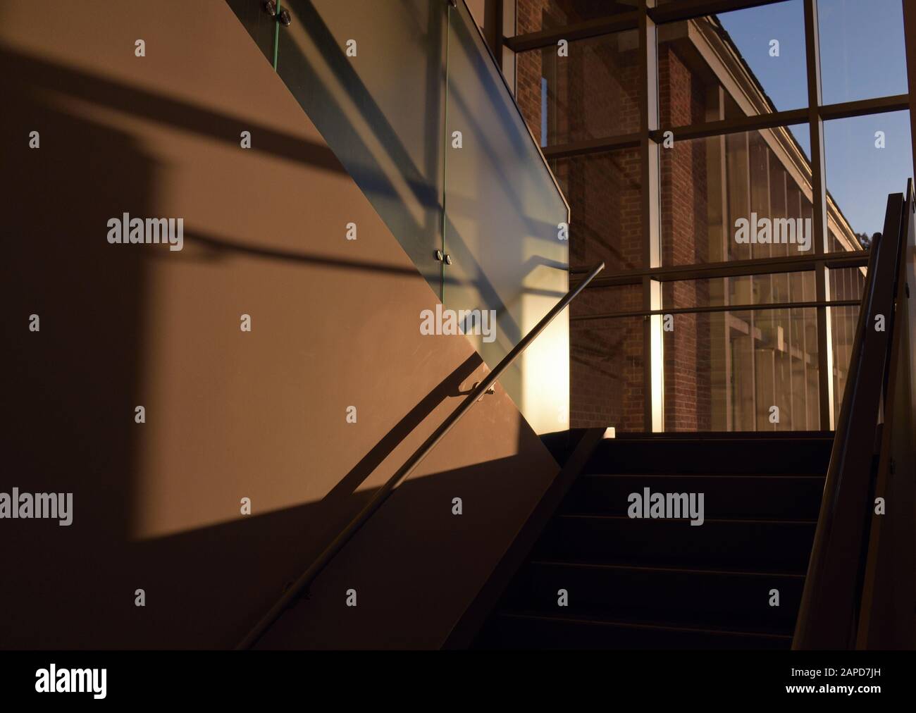 Sunset through the uprights Stock Photo - Alamy