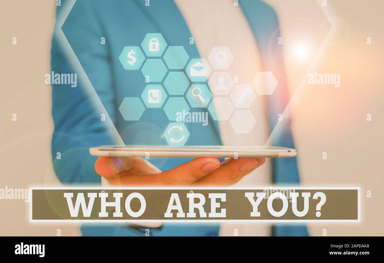 Writing note showing Who Are You question. Business concept for ...