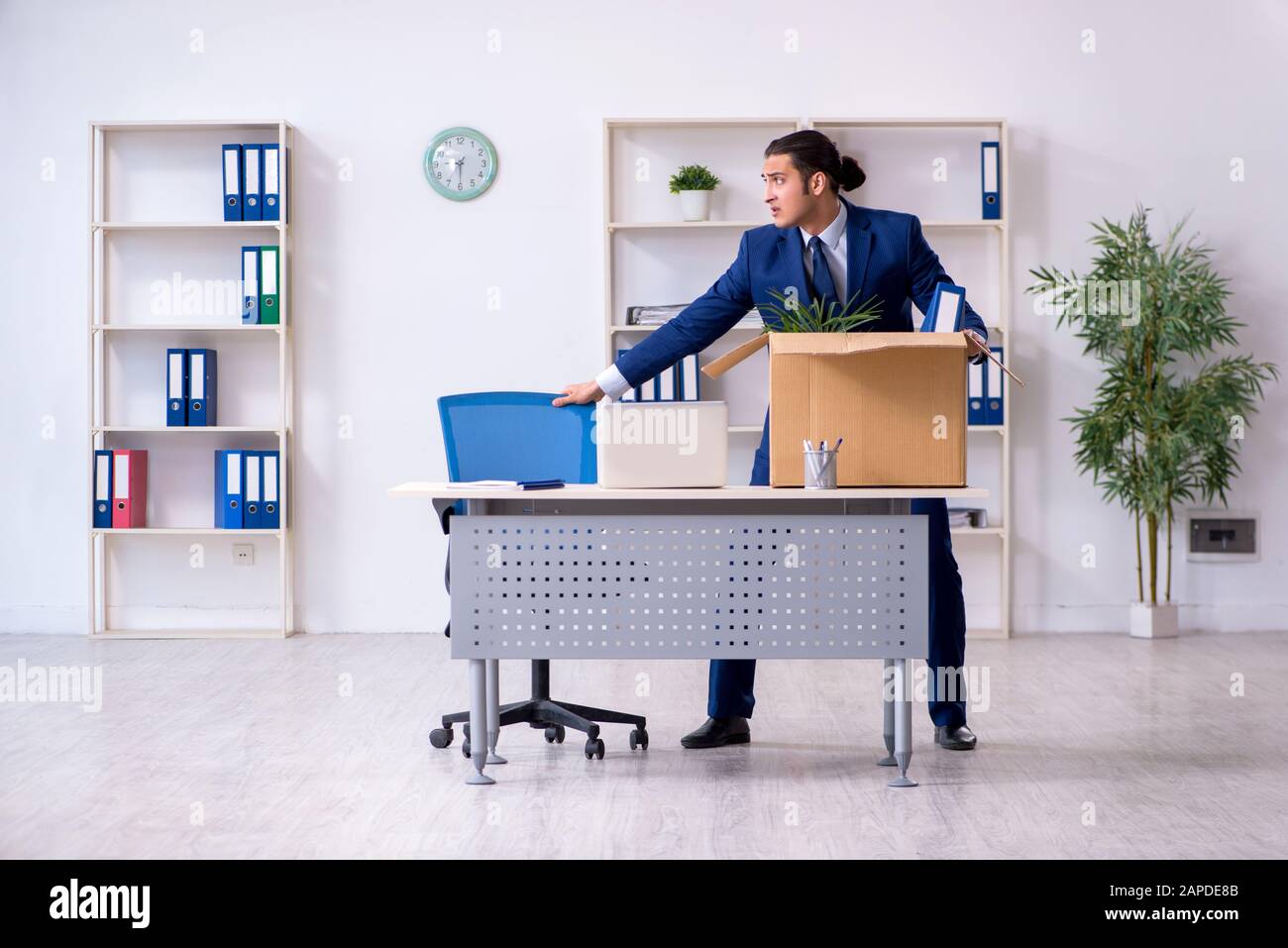 The young employee being made redundant Stock Photo - Alamy