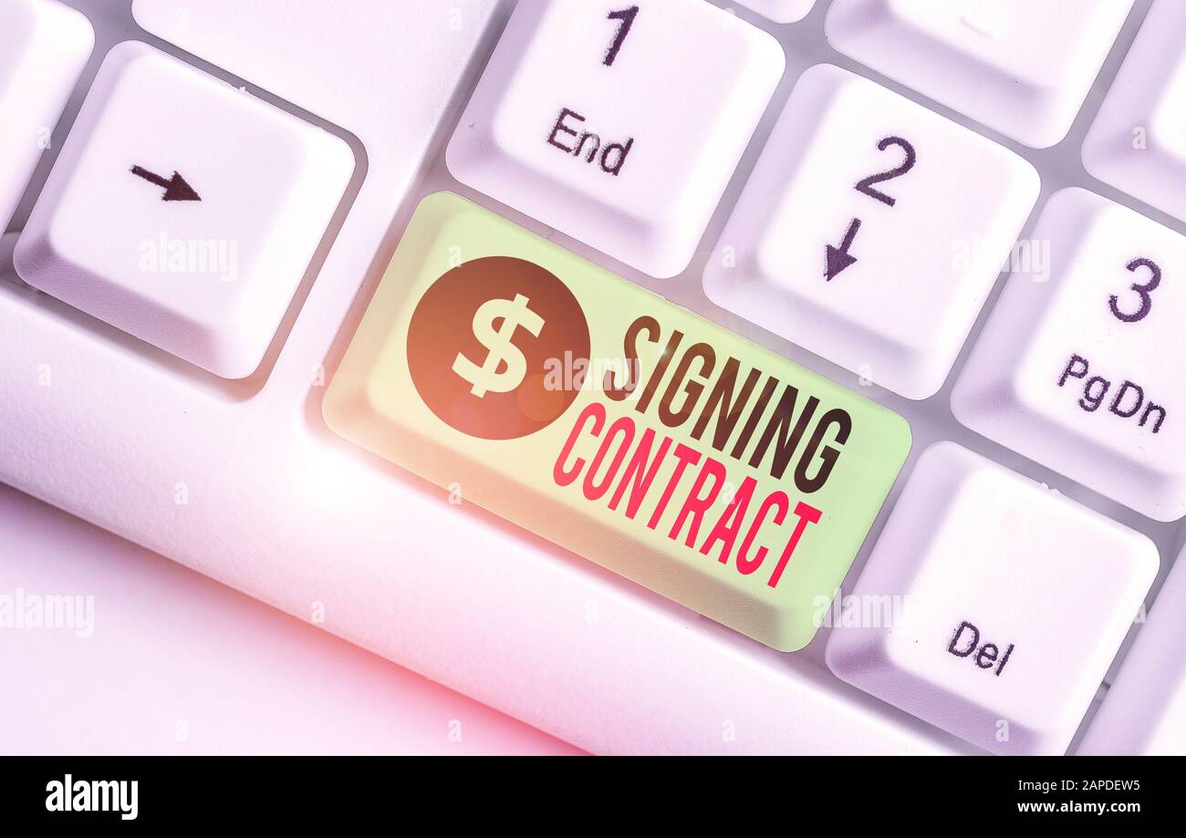 Writing note showing Signing Contract. Business concept for the parties ...