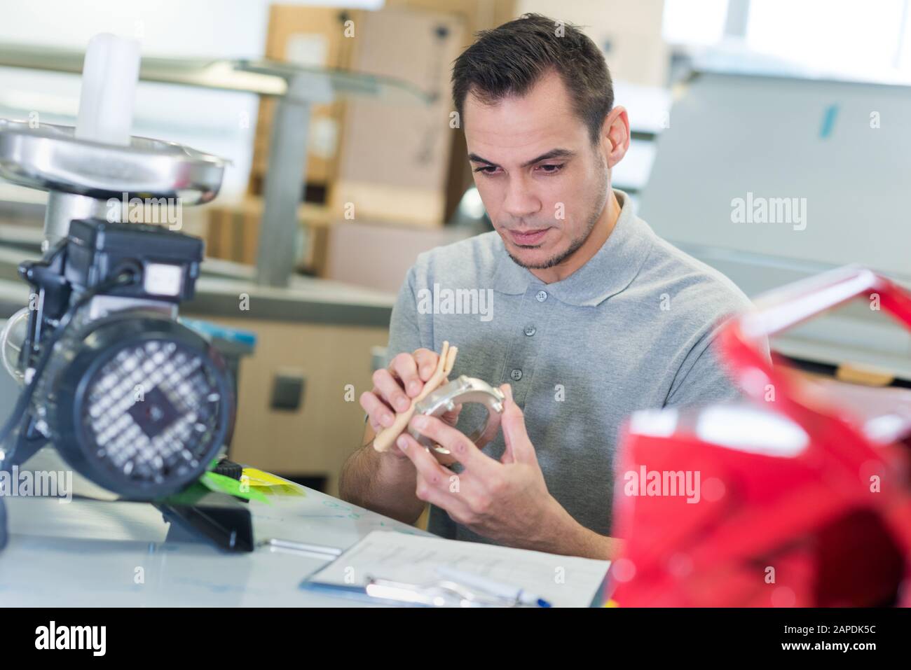 auto mechanic fixing an engine Stock Photo - Alamy